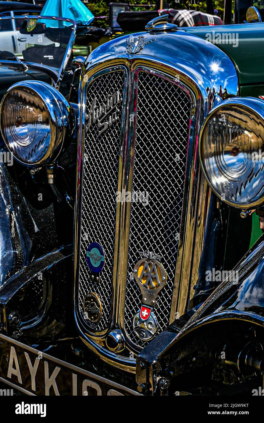 The vertical close-up view of an Austin six classic car parked outdoors ...