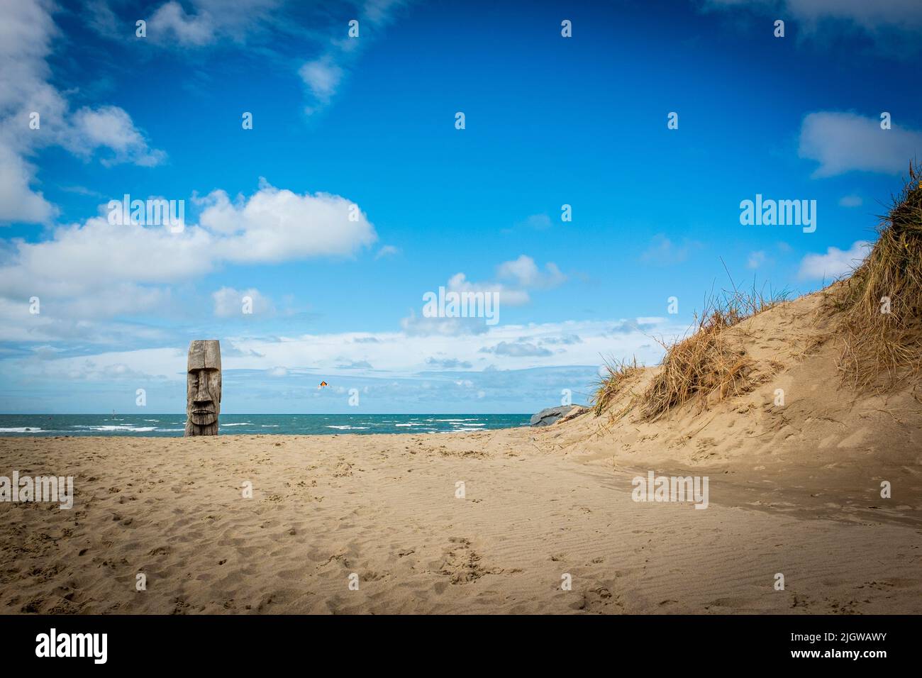 Wooden carved Easter Island Maori man, Barmouth Beach, North Wales ...
