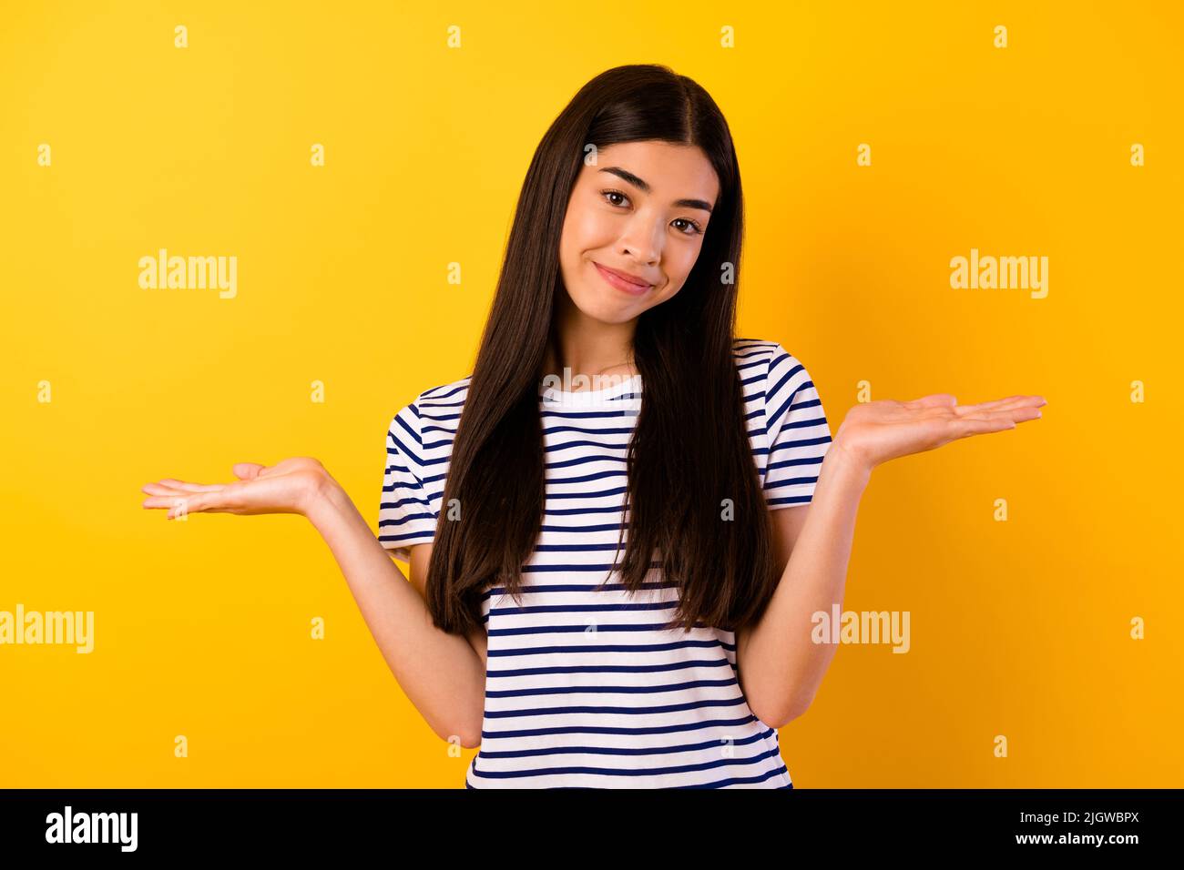 Portrait of cute positive thai lady shrug shoulder raise arms palms ...
