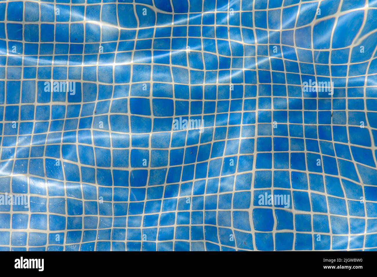 detail of water reflection in pool with small tiles Stock Photo - Alamy