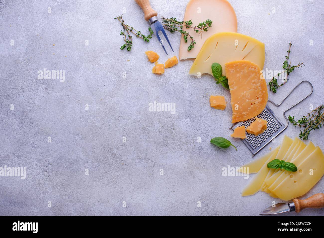 Parmesan, cheddar, gouda and maasdam cheese Stock Photo - Alamy