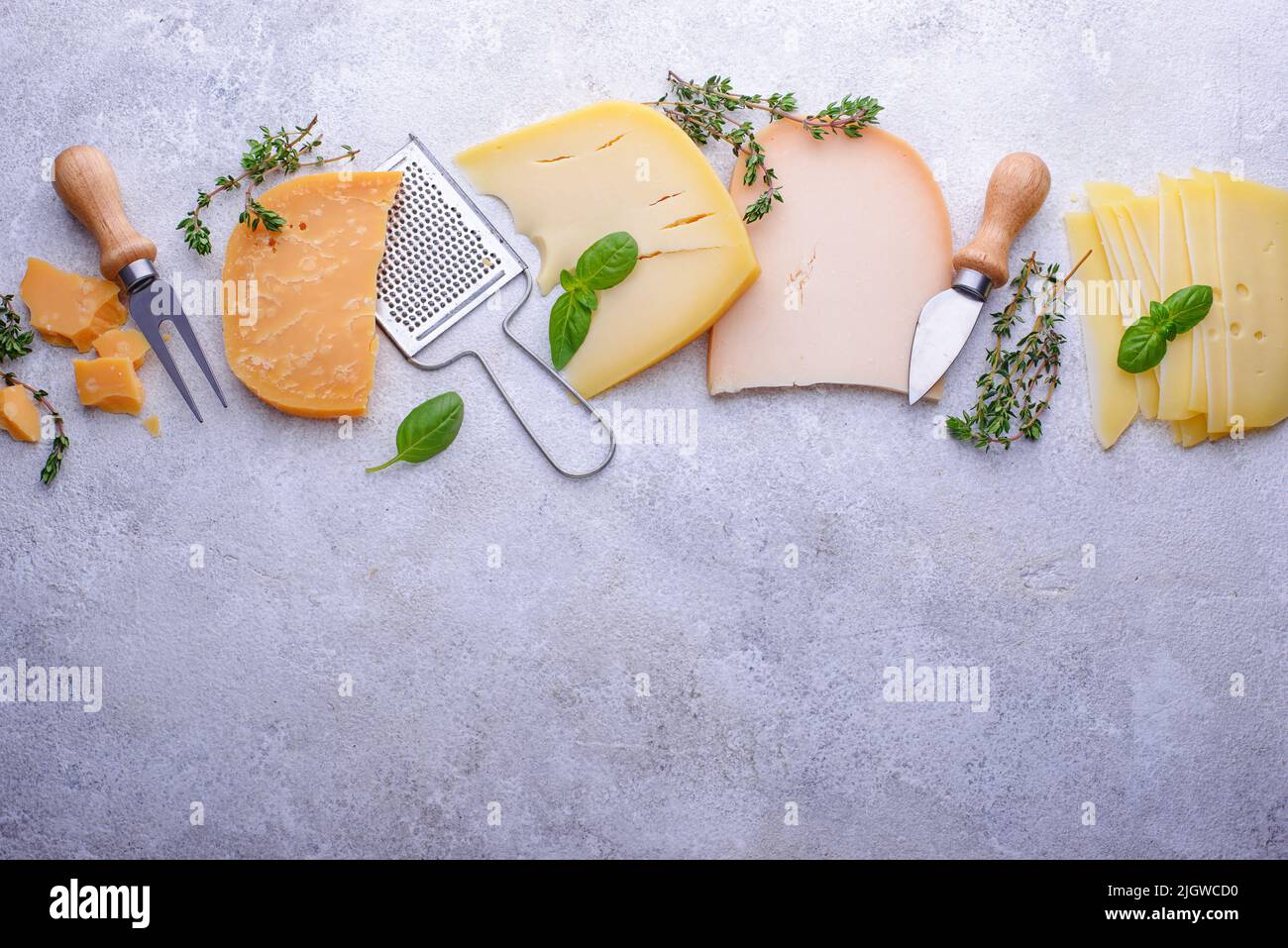 Parmesan, cheddar, gouda and maasdam cheese Stock Photo - Alamy