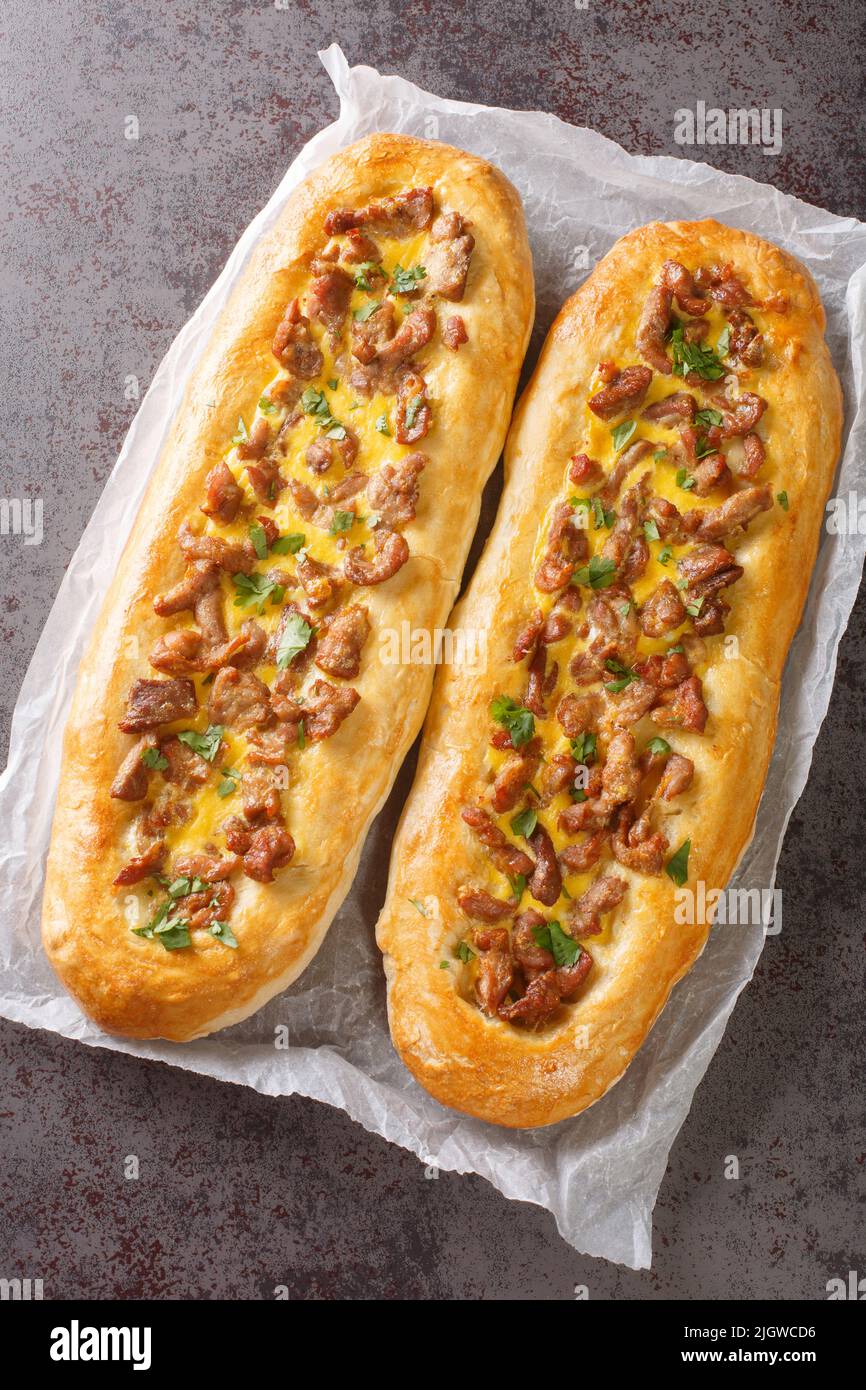 Traditional oven baked Macedonian meat pie pastrmajlija closeup on the ...