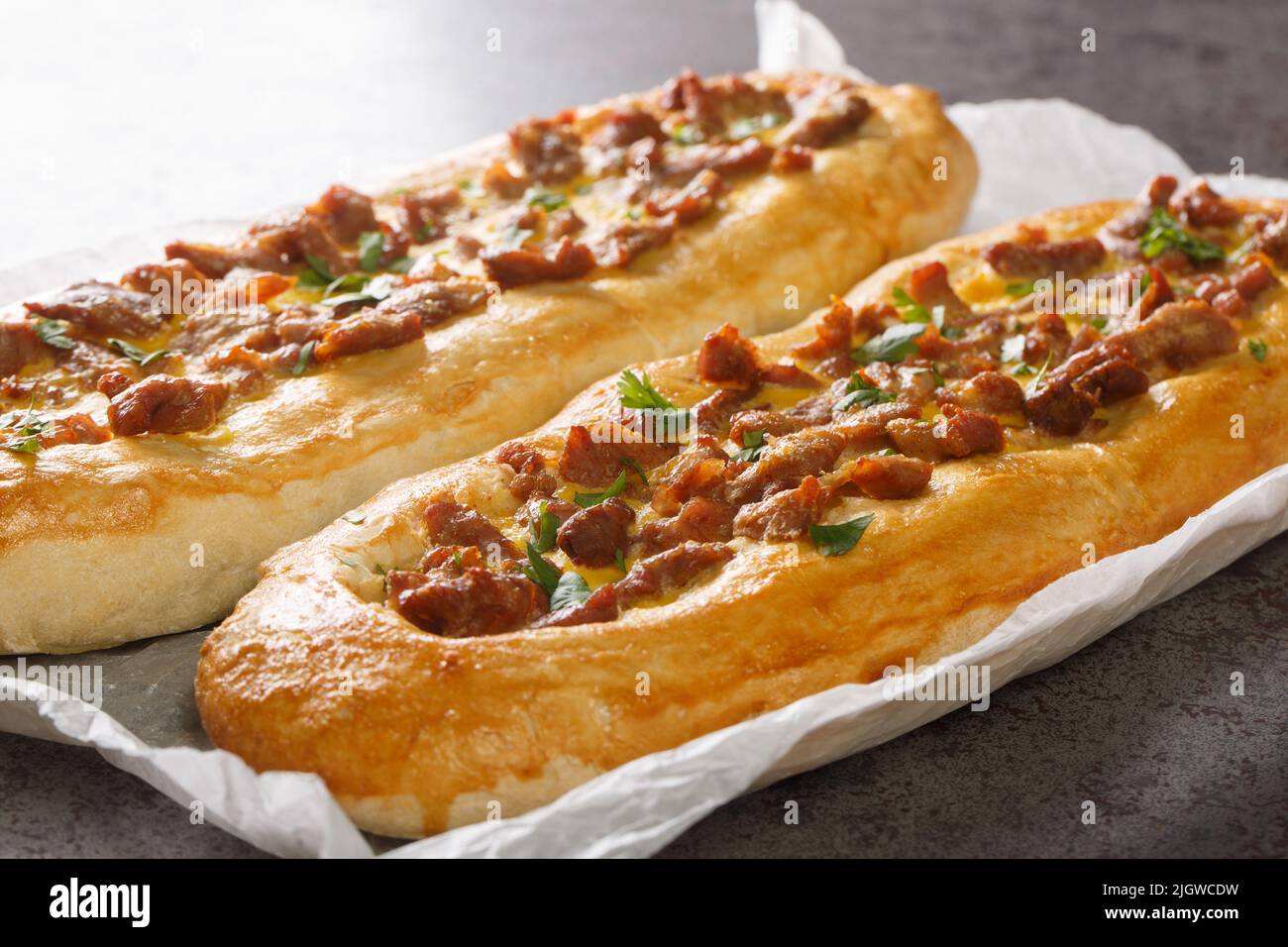 Macedonian pastrmajlija pie, made with with hot peppers, chunks of meat ...