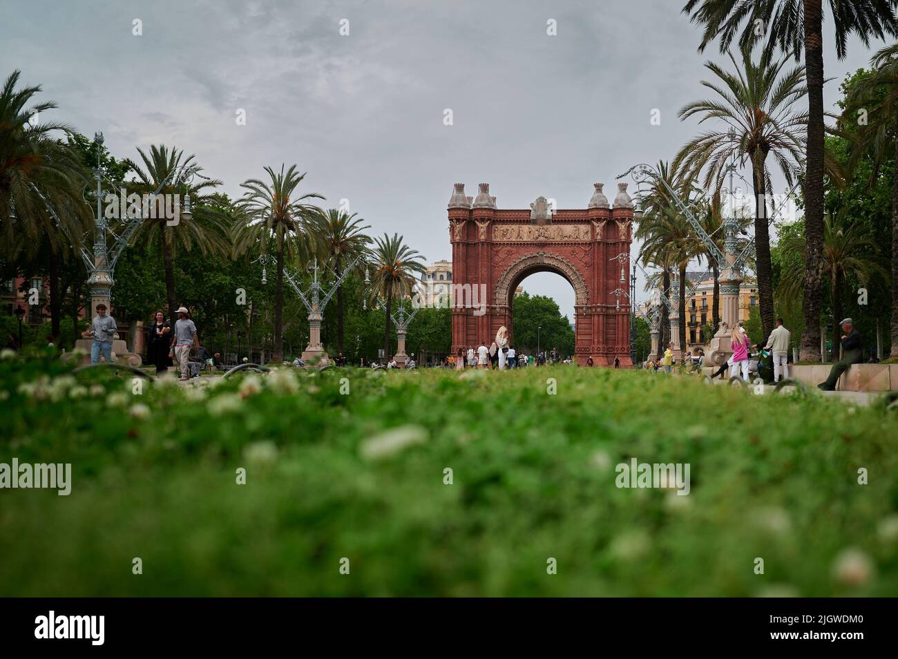 low angle with vegetation showing The Arc de Triumf in Barcelona on the ...
