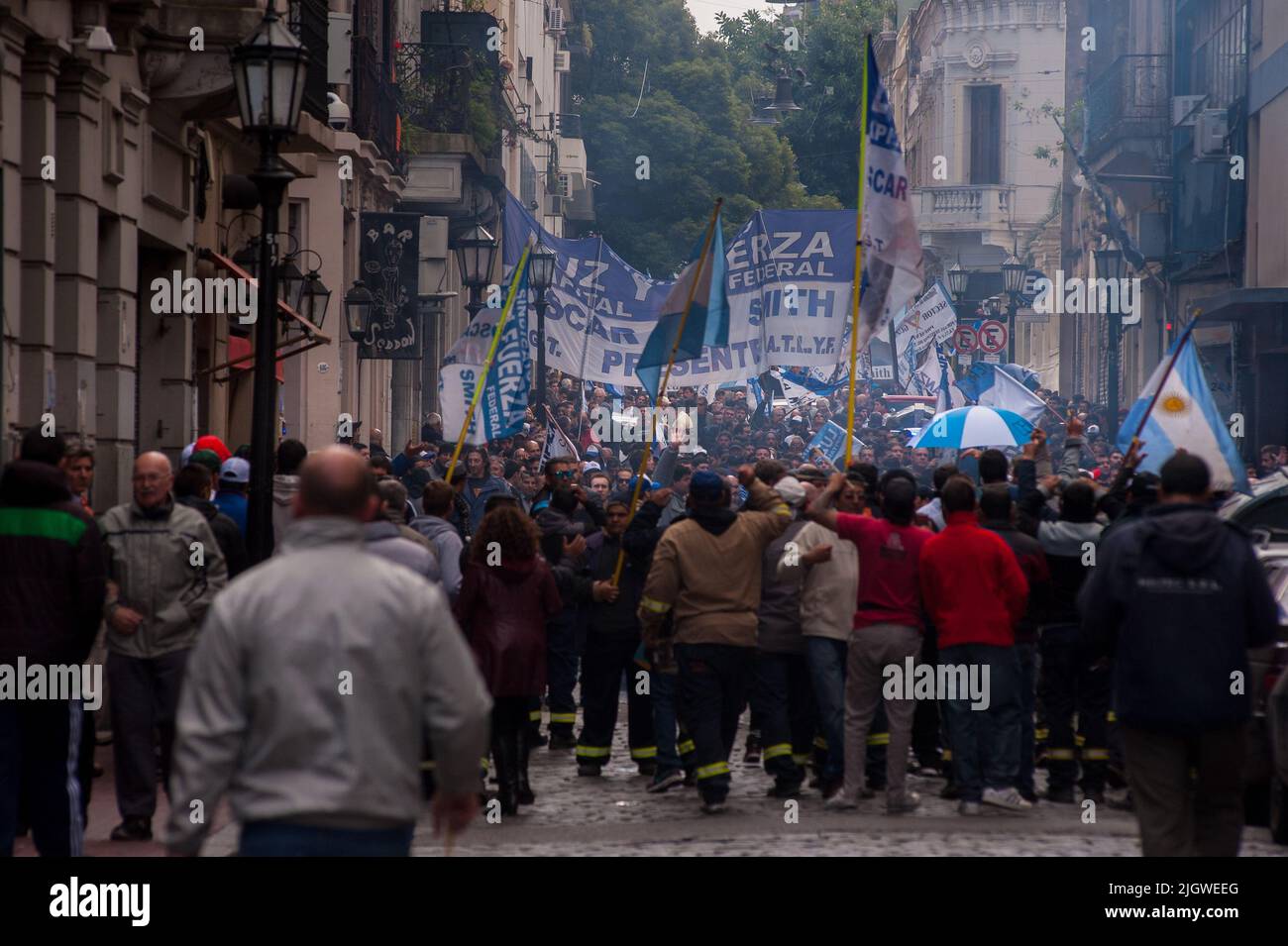 The Hispanic demonstrators with posters walking during the Workers' Day ...