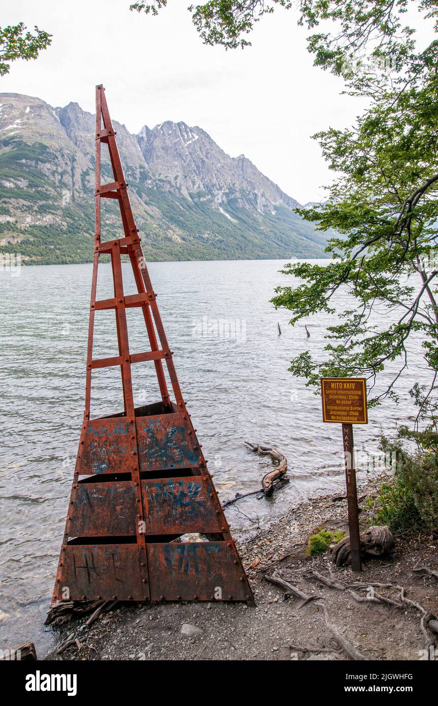 A vertical of boundary marker signs the frontier between Argentina and ...