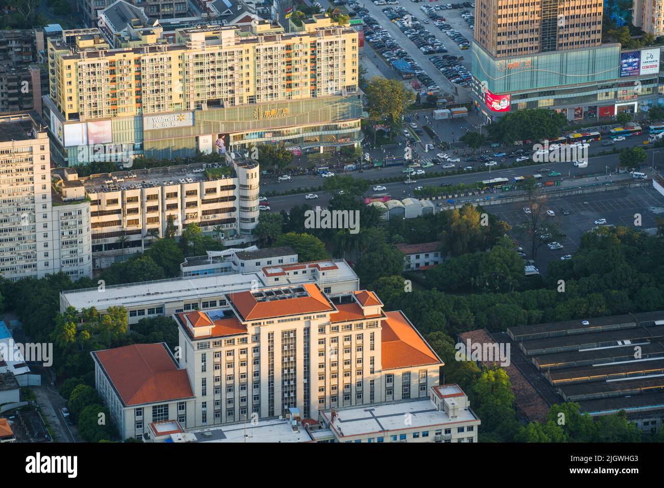 An aerial view of modern buildings and busy streets of Guangzhou, China ...