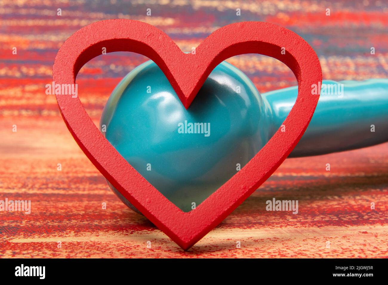 Heart shape and weight for physical activity to symbolize ...