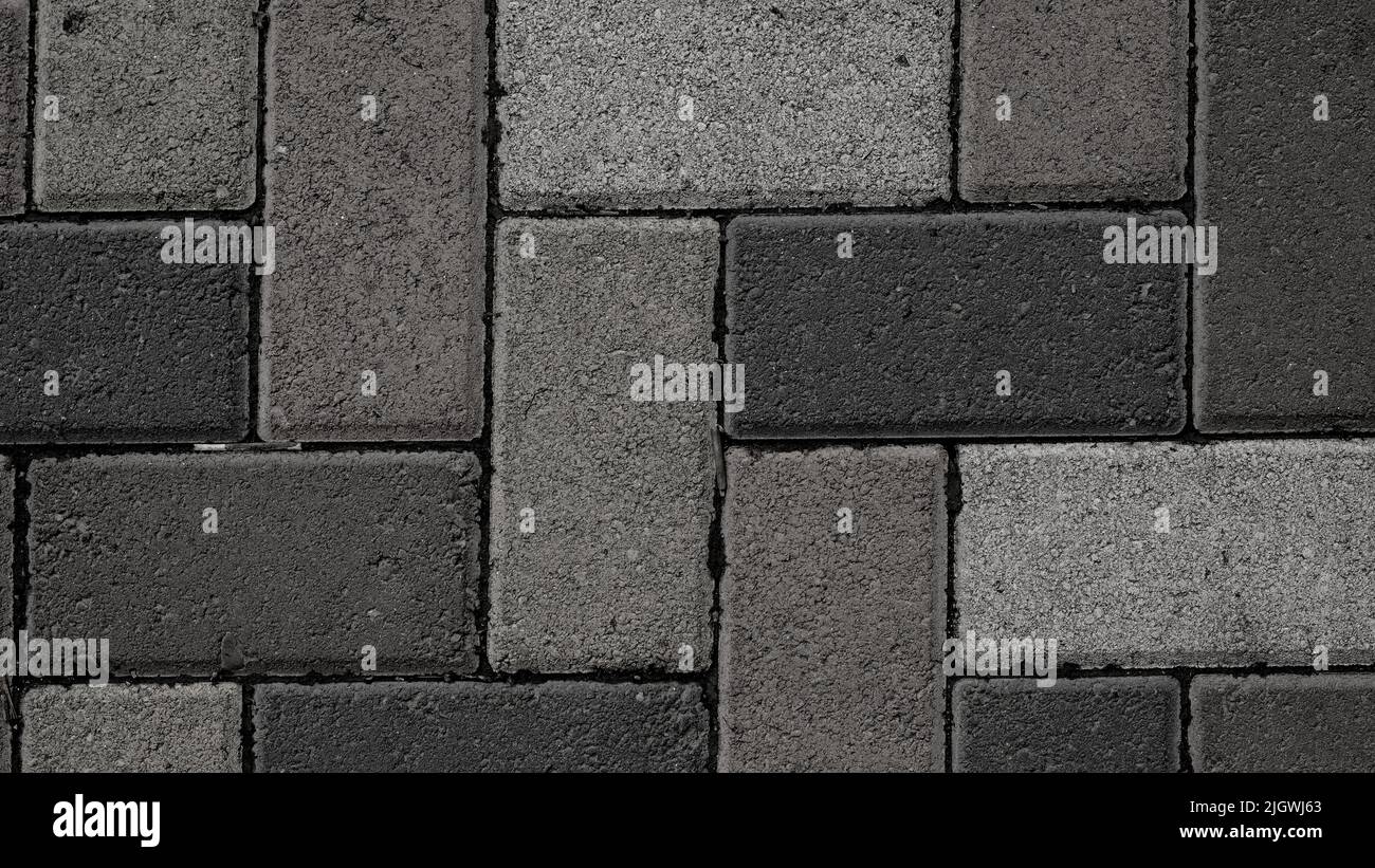 Grey brick old stone street road, pavement texture Stock Photo - Alamy