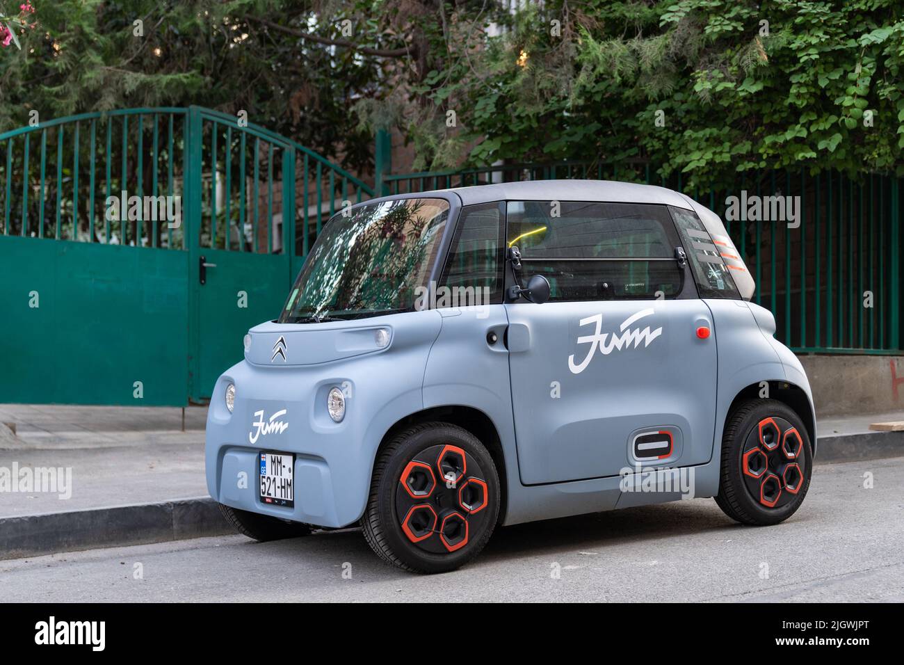Electric Citroen Ami micro car zero emission parked. Modern 2 passenger electric quadricycle Stock Photo Alamy