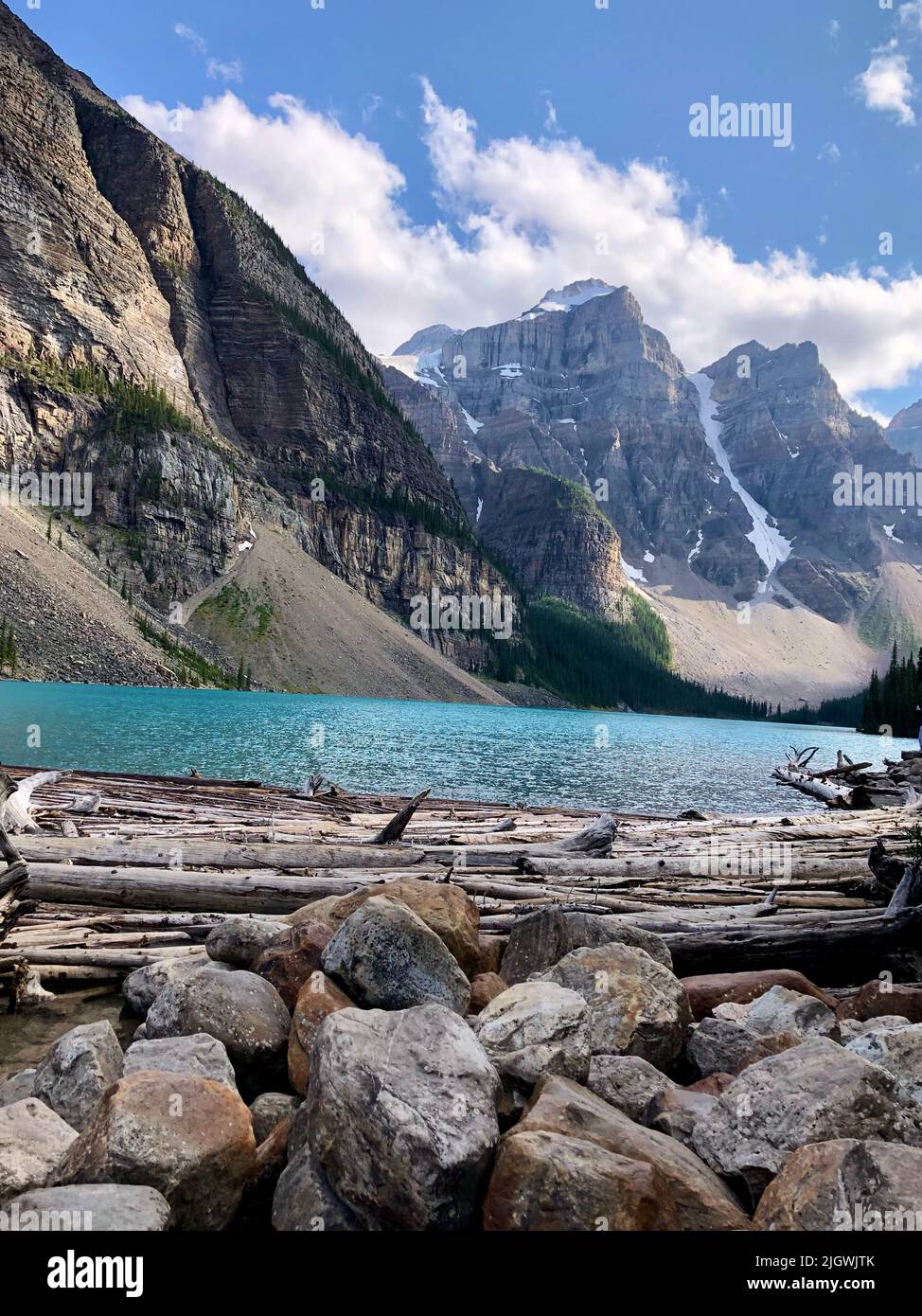 Purple blue mountains and turquoise blue mountain lake with gorgeous ...