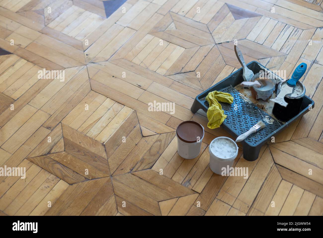 Renovated brown oak parquet, Reconstruction old house symbol, Wooden ...