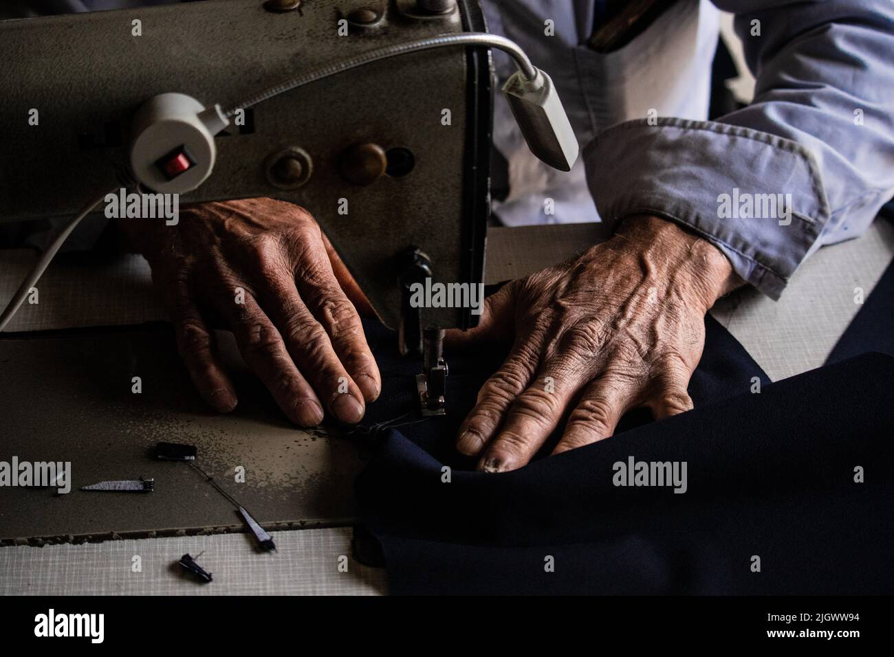 Repairing a machine Stock Photo - Alamy