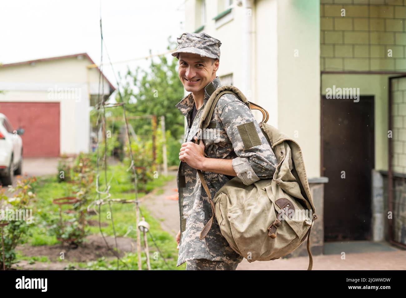 Young caucasian man wearing camouflage army uniform Stock Photo - Alamy