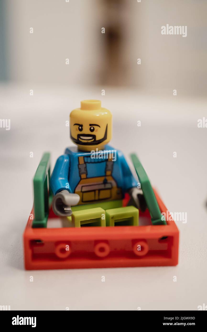 A Lego man with beard figurine sitting inside an open window Stock ...