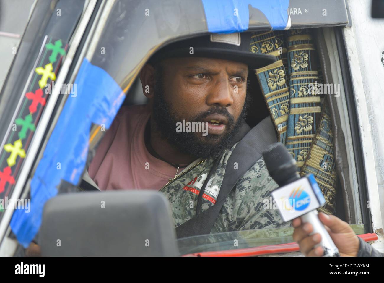 Addis Ababa, Ethiopia. 8th July, 2022. Tewodros Meshesha, a taxi driver ...