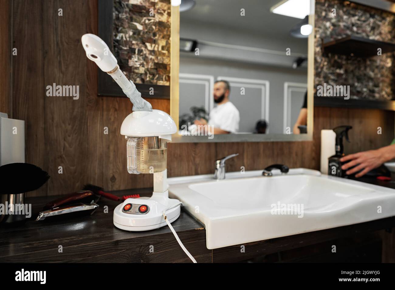Steam machine in barbershop, professional shaving service Stock Photo ...