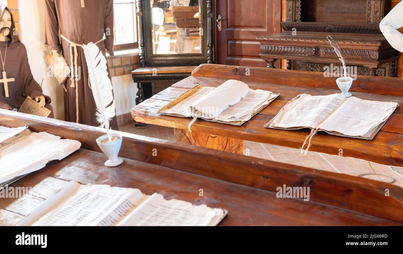 Catholic monks are literacy teachers in a medieval school. School in a ...