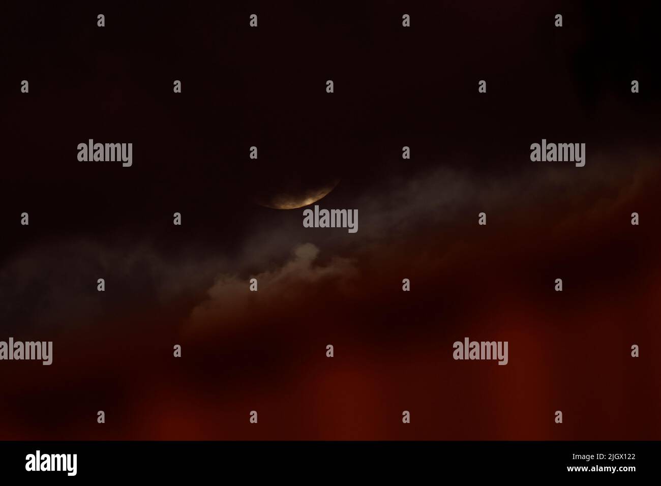 Perth WA, Australia. July 13th, 2022. Part of the Full buck moon seen ...