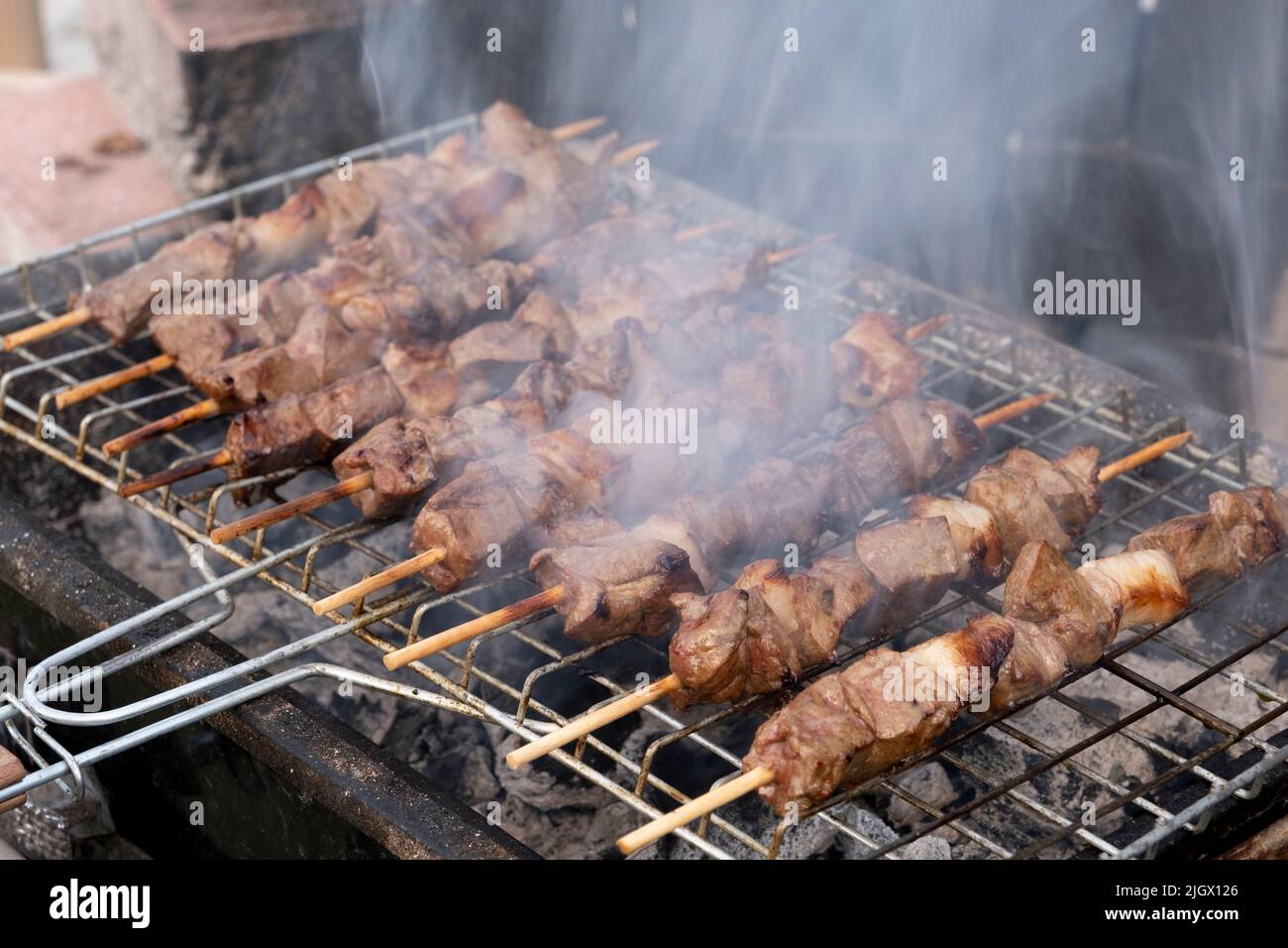 Liver kebab, traditional Turkish liver shish or kebap on the grill ...