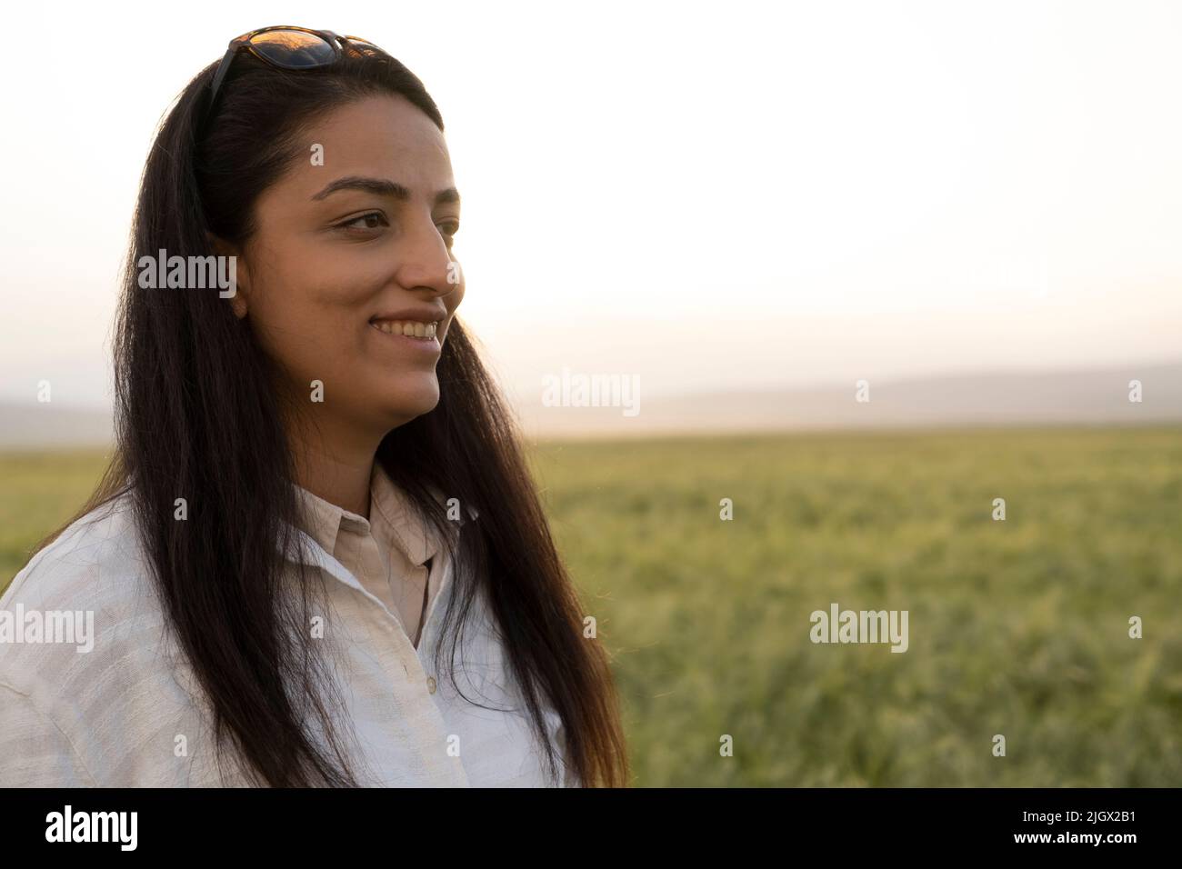 Woman farmer, side view portrait of young woman farmer looking copy ...
