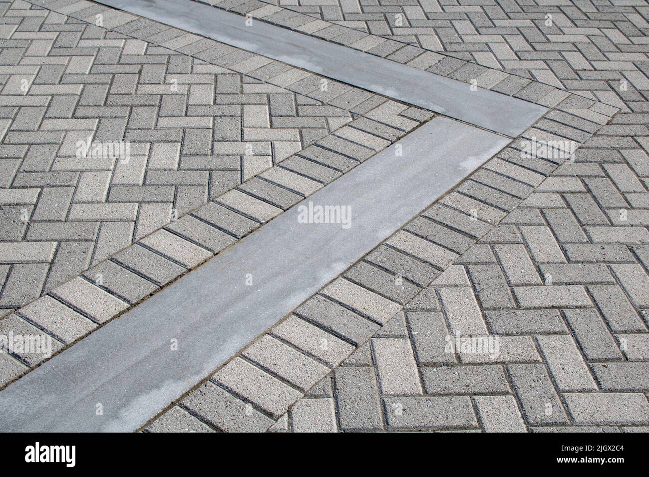 White and grey brick outdoor walkway Stock Photo - Alamy