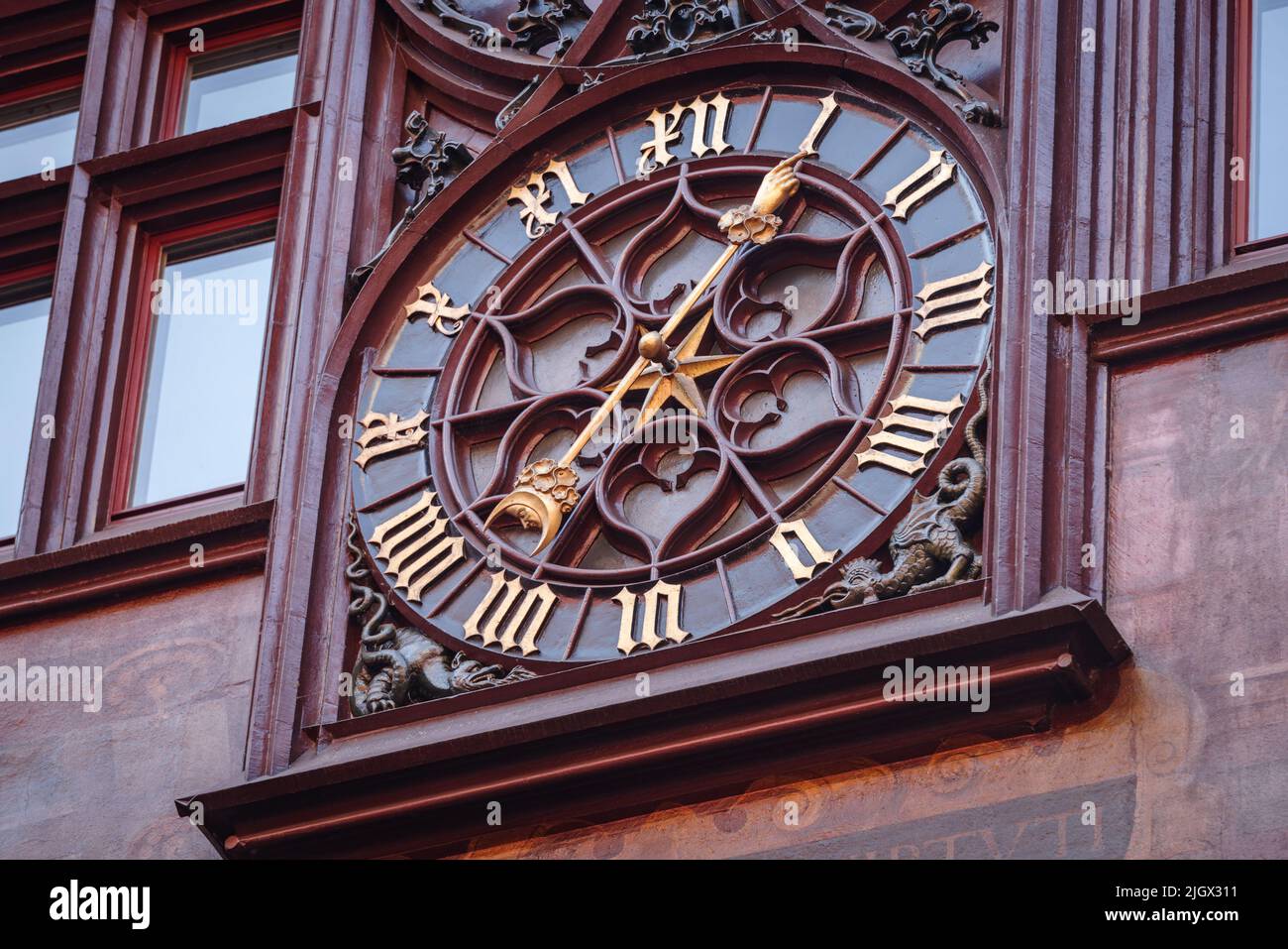 Low angle view of clock at Basel Town hall, Switzerland Stock Photo - Alamy
