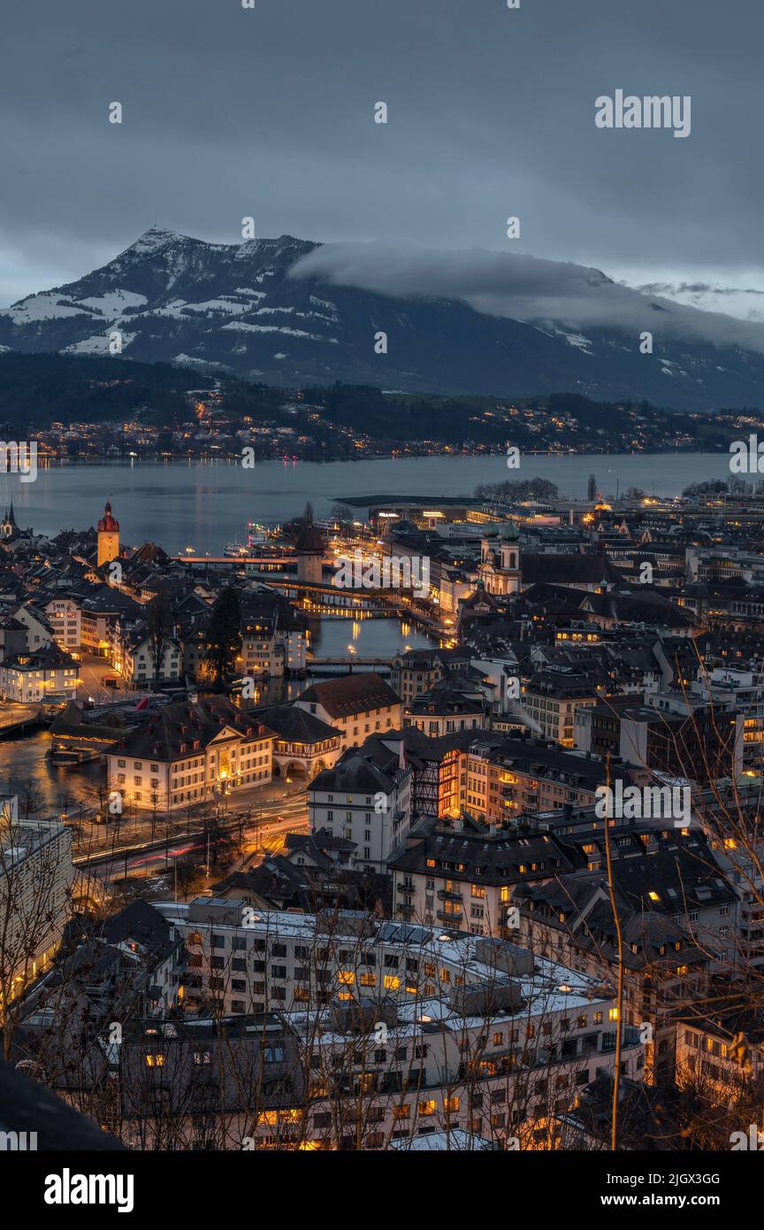 A vertical cityscape view of the illuminated Lucerne Old town in ...