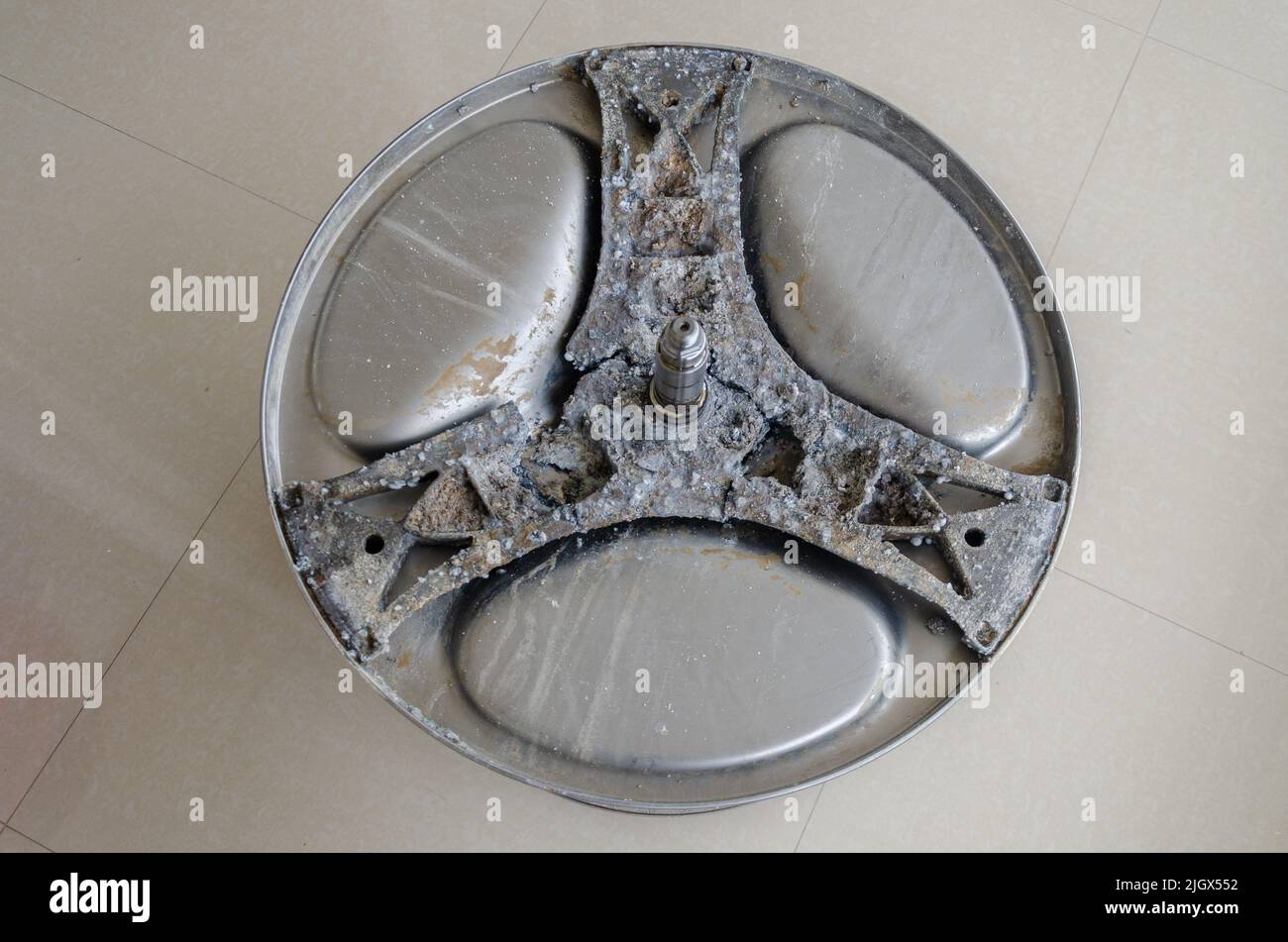 Corroded Aluminium Spider of a washing machine Stock Photo - Alamy