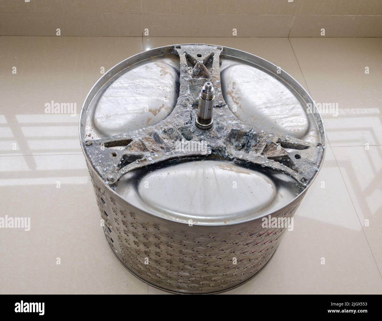 Corroded Aluminium Spider of a washing machine Stock Photo - Alamy
