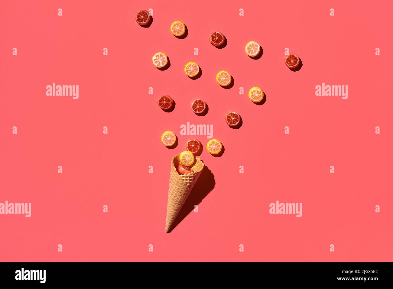 A variety of delicious sweets explode from the waffle cone, view from ...