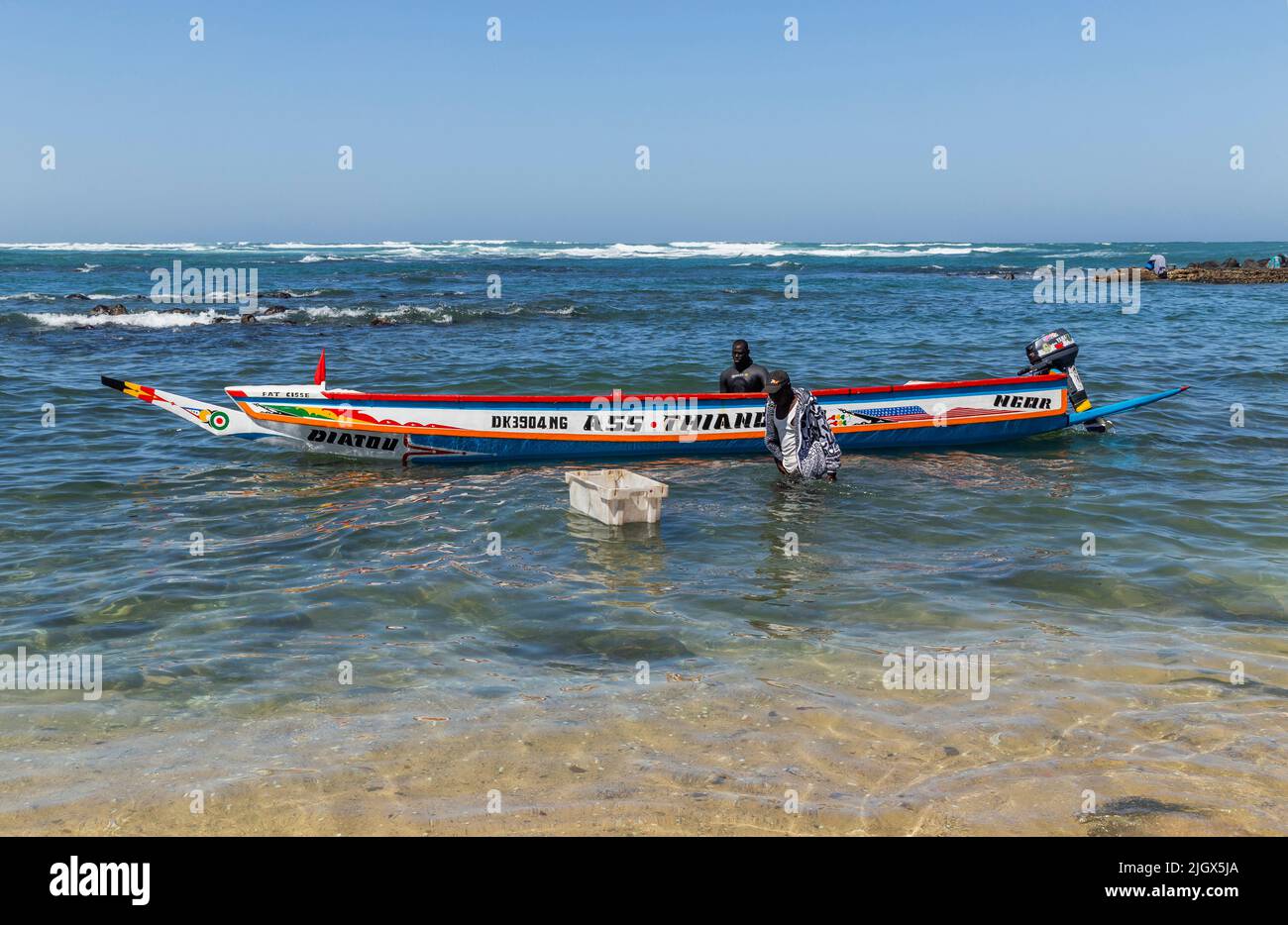 Dakar, Senegal. August 18, 2019: Fishermen with a fishing boat in a ...