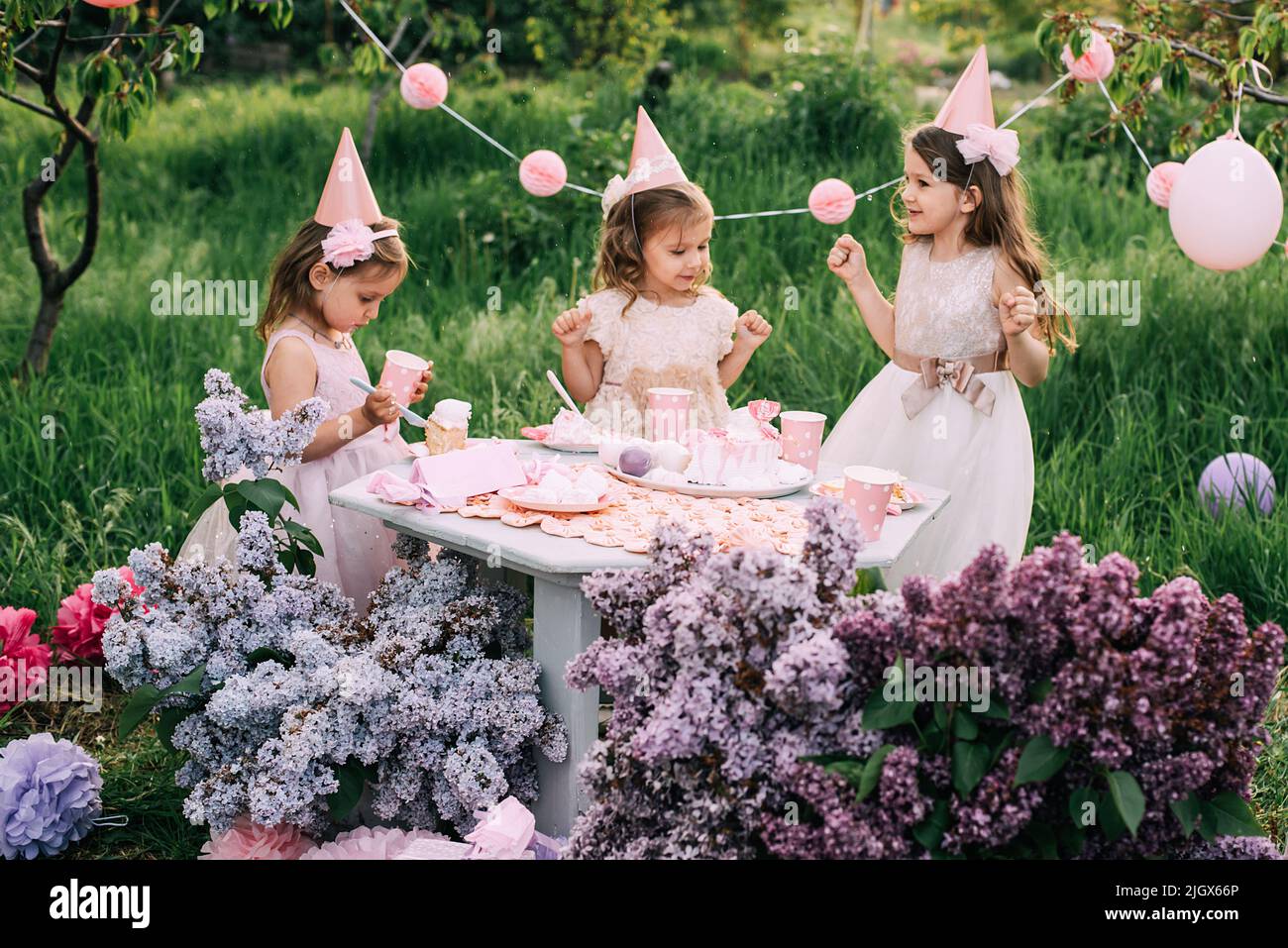 Summer outdoor kids birthday party. Group of happy Children celebrating ...