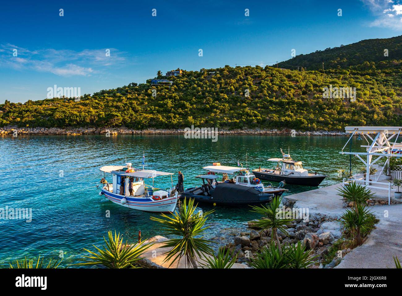 Traditional fishing boats at Steni Vala port the second most populous ...