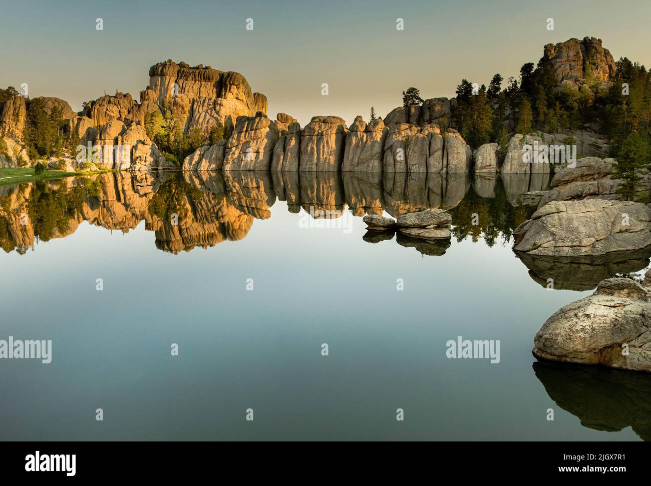 Sylvan Lake sunrise reflection Stock Photo - Alamy