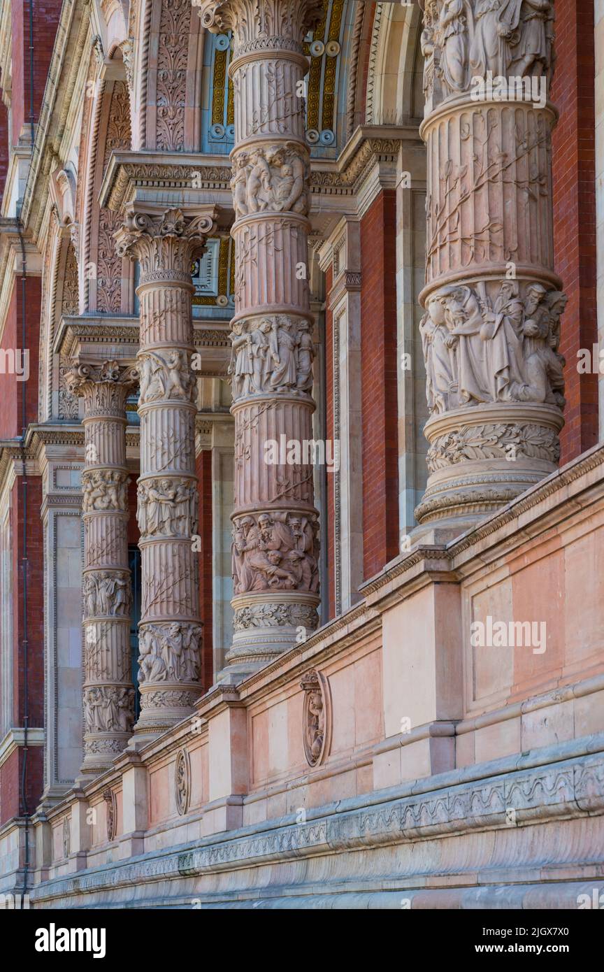 Ornate sculpted columns along the facade of the Henry Cole Wing of the ...