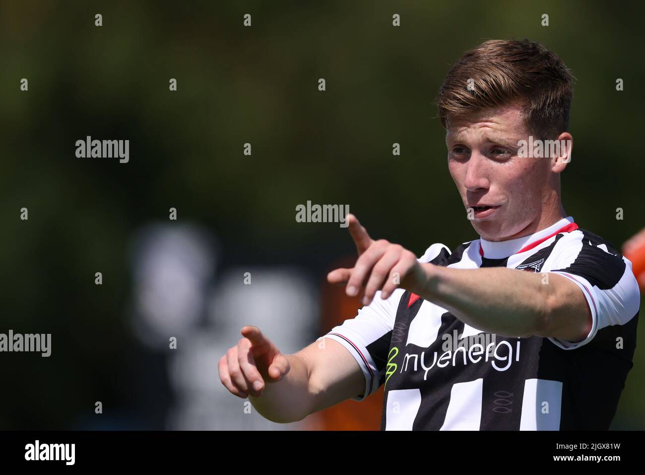 Grimsby, England, 9th July 2022. Harry Clifton of Grimsby Town reacts ...