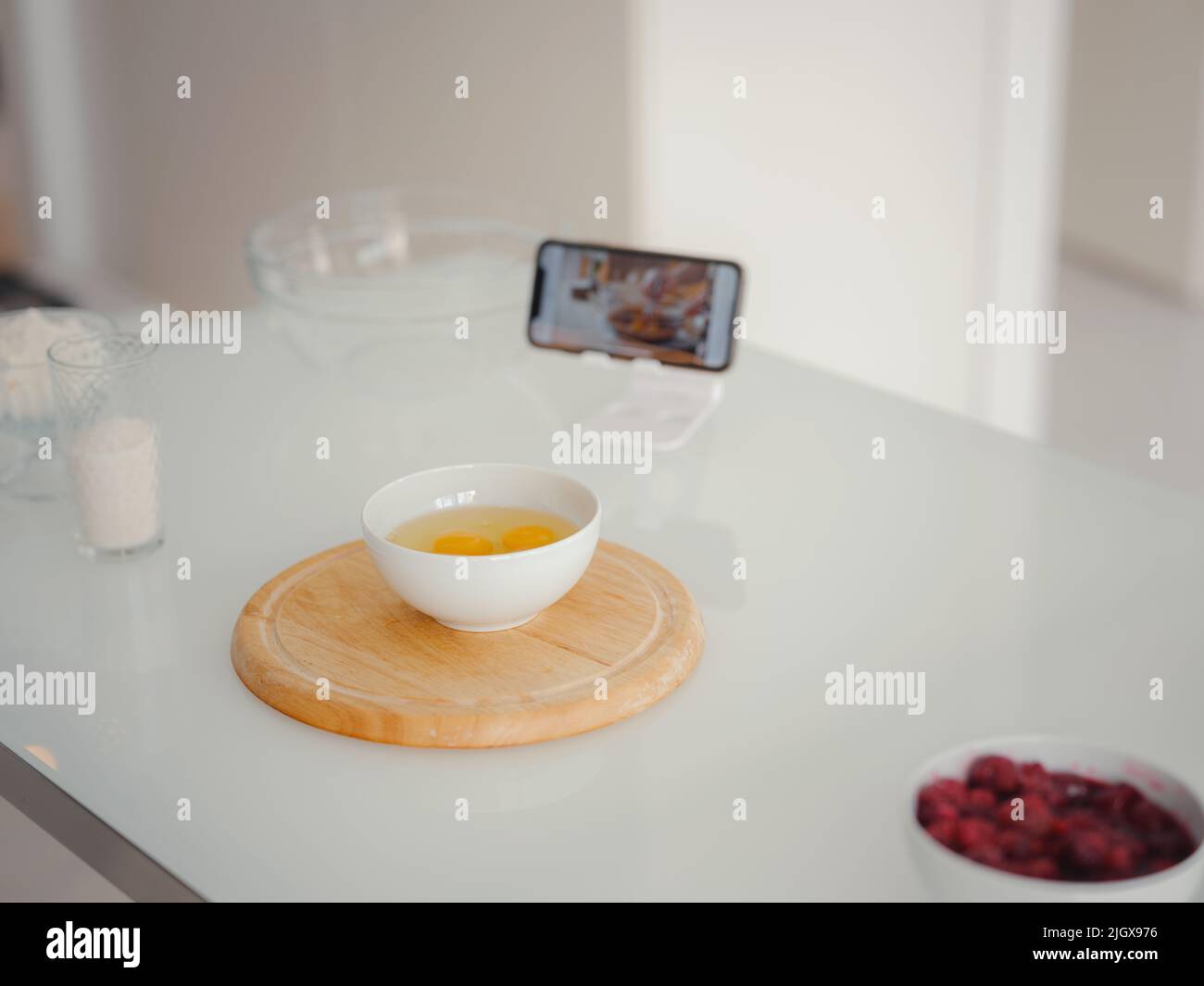 The concept of online lessons in preparation of cookies. smartphone and ...