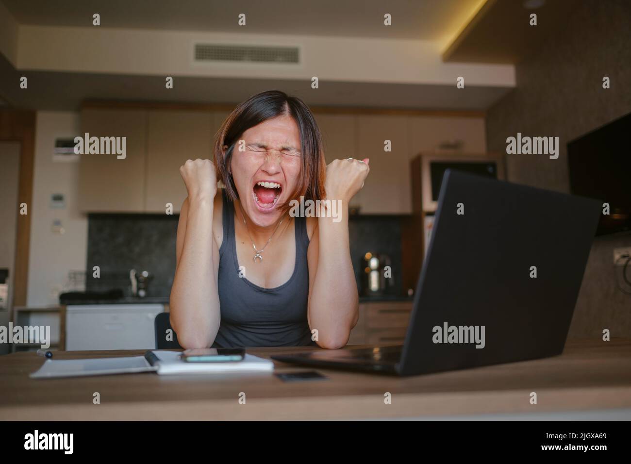 remote job, failure and stress concept - angry young woman with laptop ...