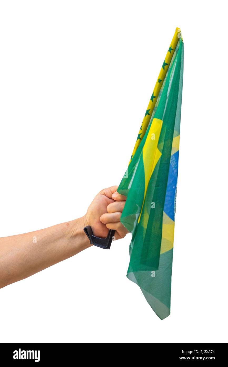 Holding Brazil flag isolated on white Stock Photo - Alamy