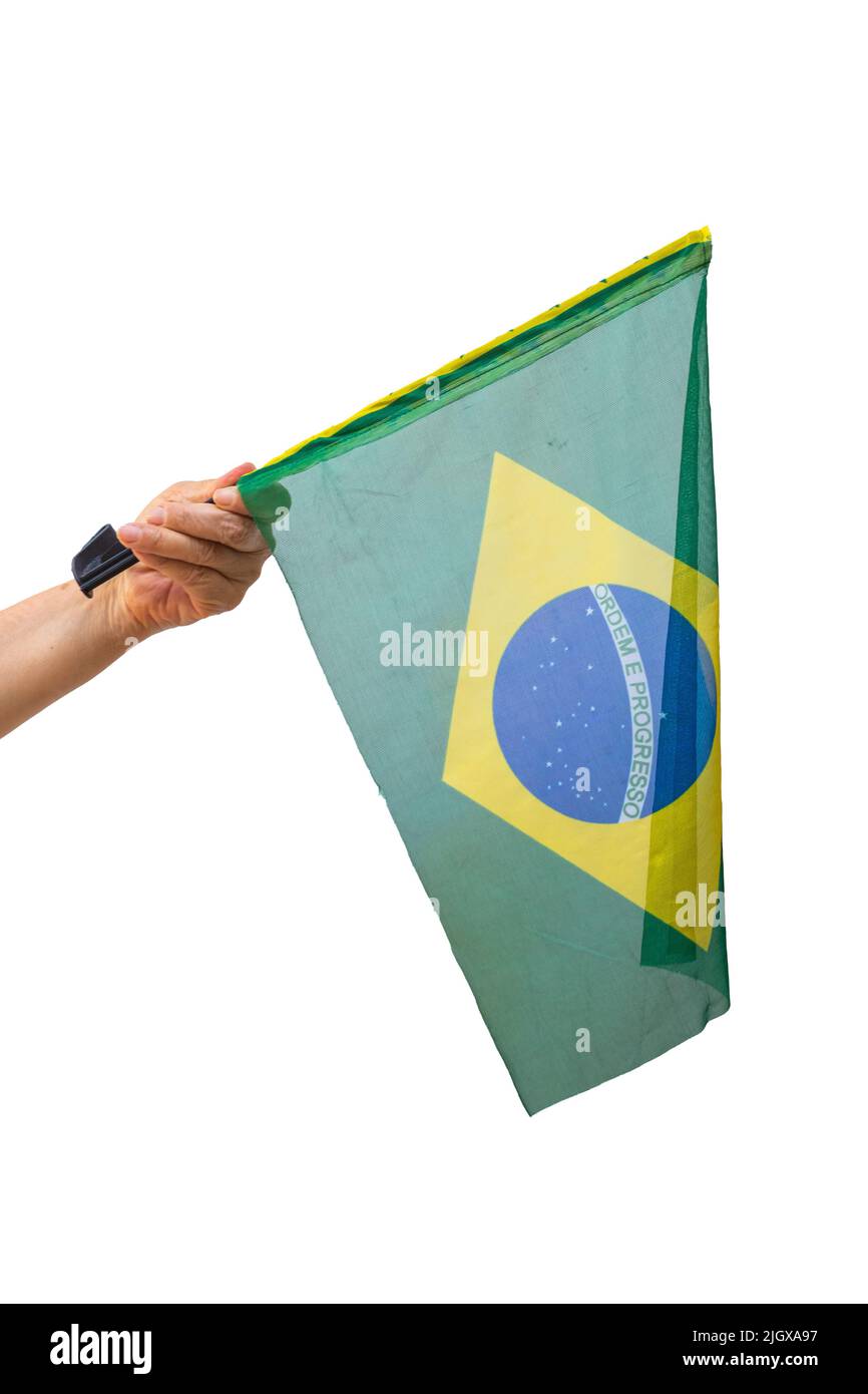 Holding Brazil flag isolated on white Stock Photo - Alamy