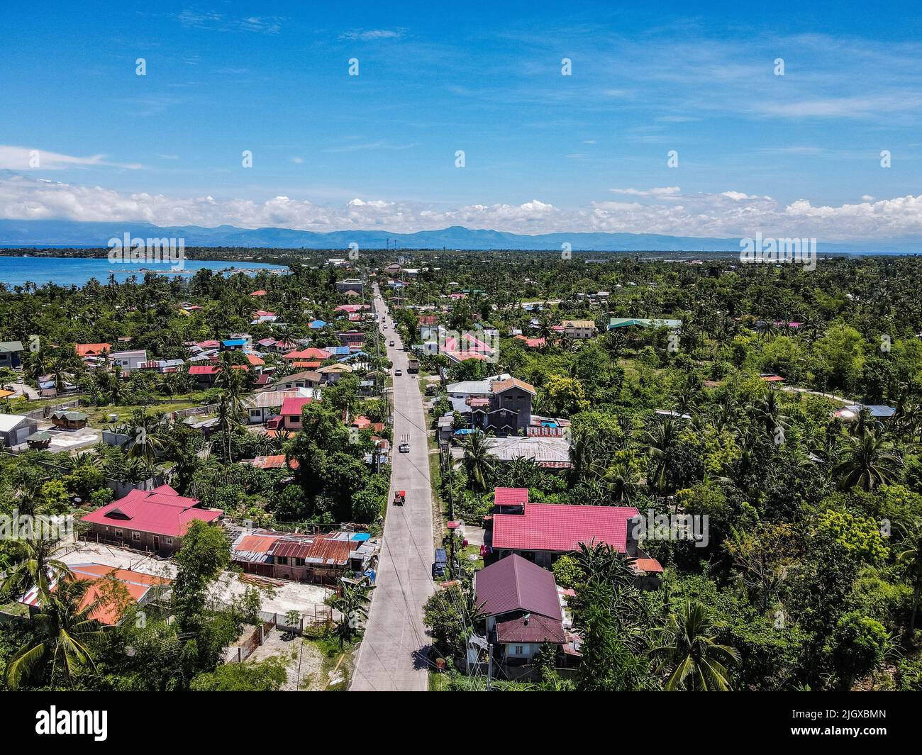 Moalboal, Philippines. 13th July, 2022. Aerial view of the road leading ...