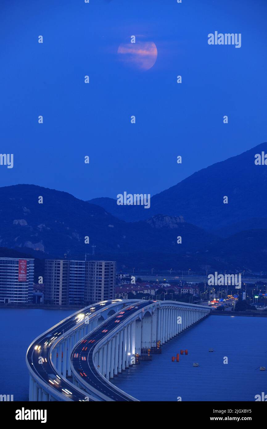 Zhoushan, China's Zhejiang Province. 13th July, 2022. A supermoon is ...