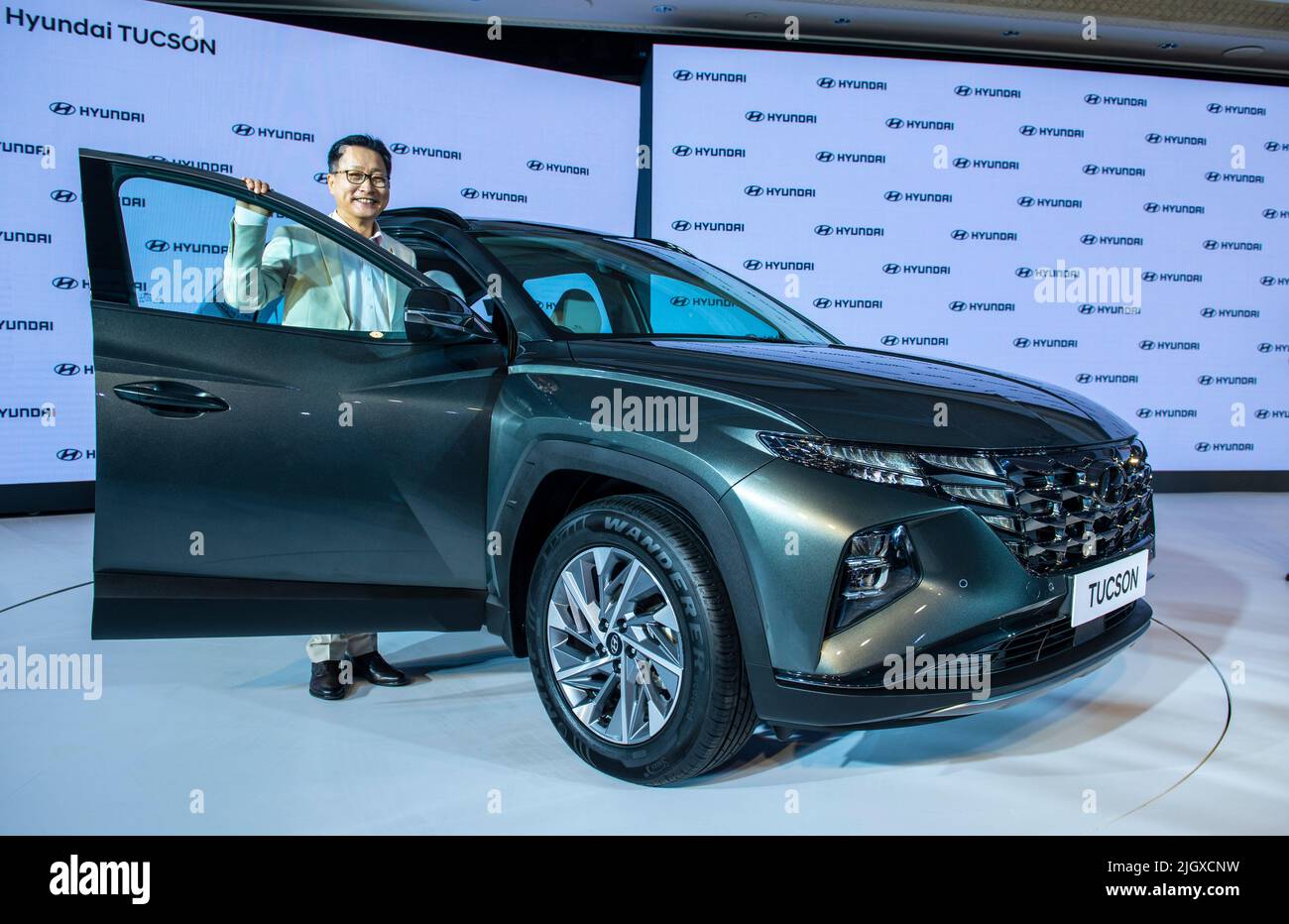 Unsoo Kim MD and CEO of Hyundai Motor India Ltd stands with a new ...