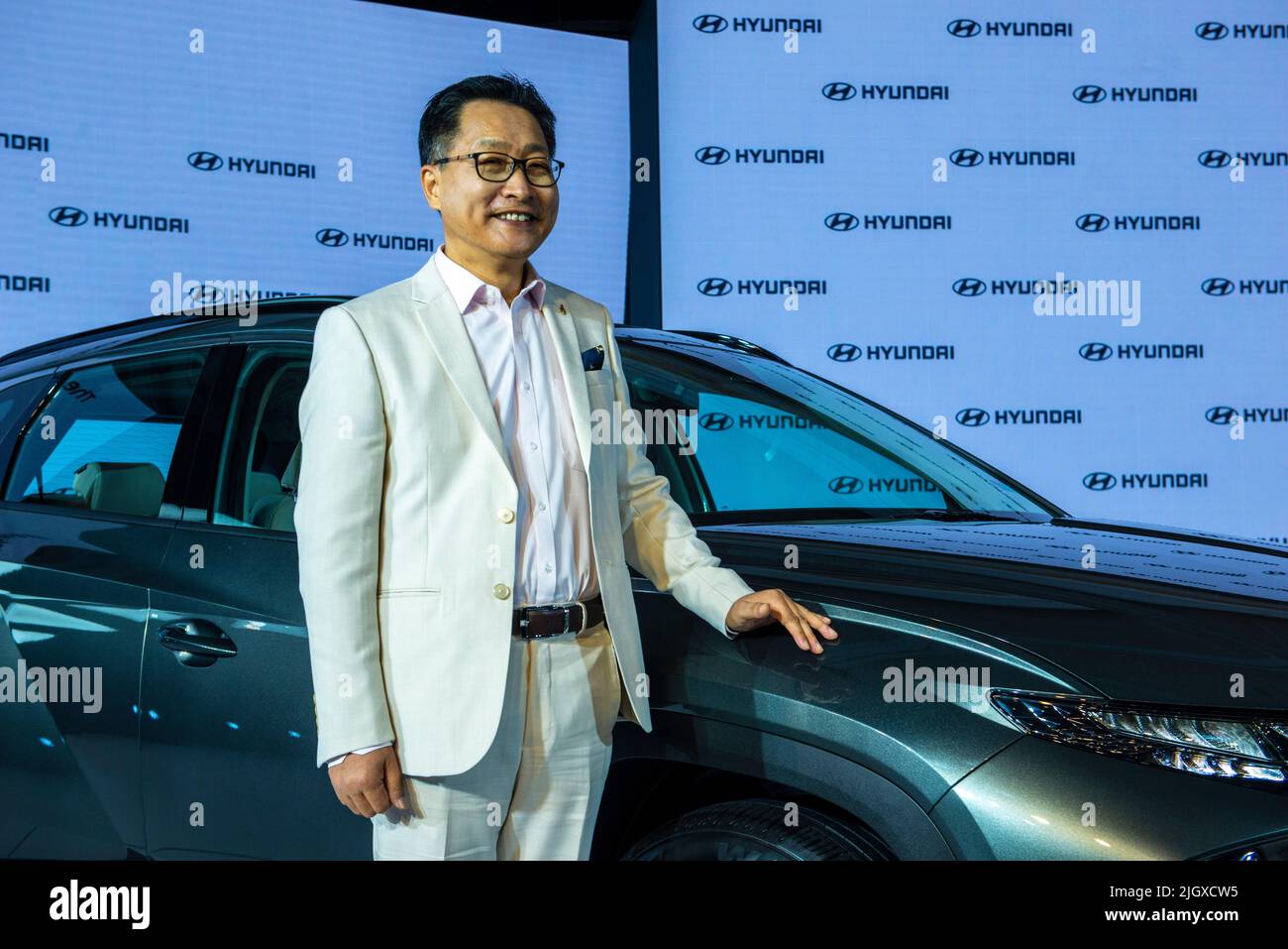 Unsoo Kim MD and CEO of Hyundai Motor India Ltd stands with a new ...