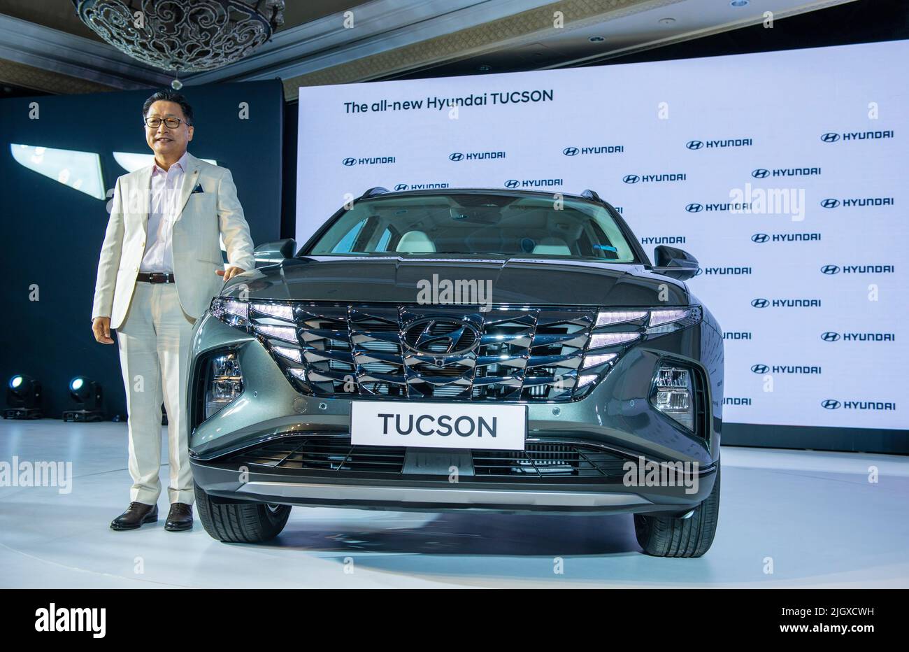 Unsoo Kim MD and CEO of Hyundai Motor India Ltd stands with a new ...