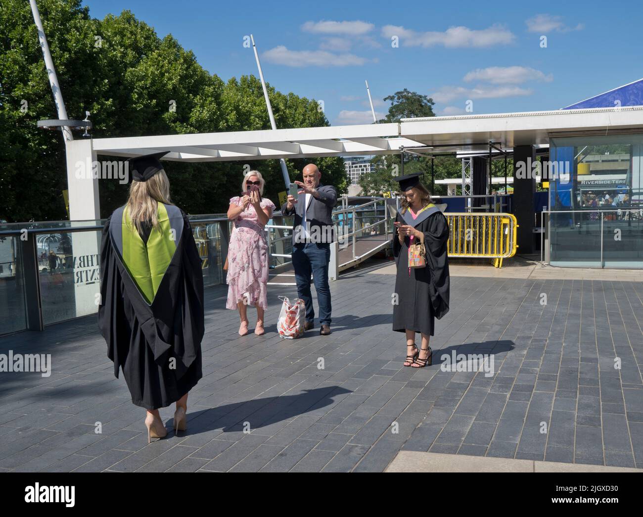 Graduate student photographed by family at the South Bank Centre by ...