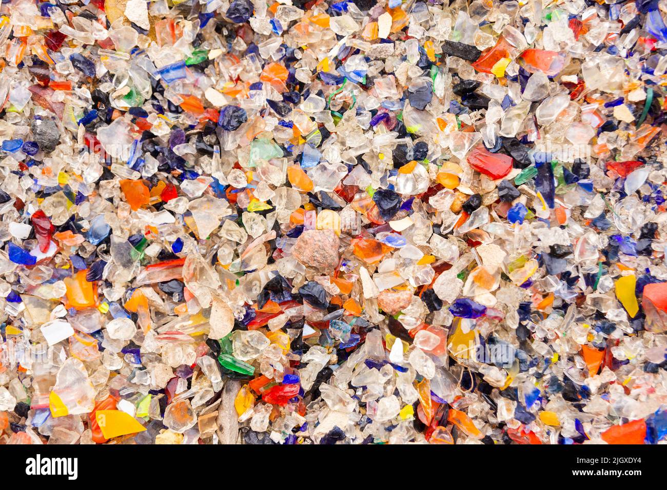 Background with various colors of natural small mineral crystal glass ...