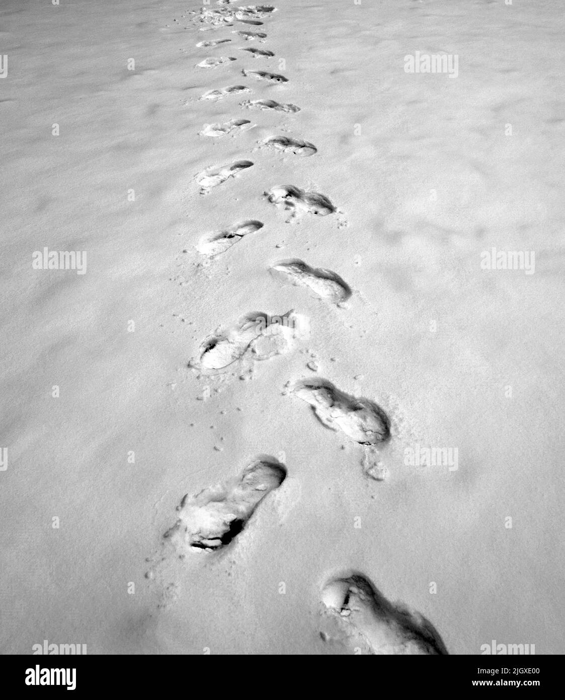 Human footprints in the snow Stock Photo - Alamy